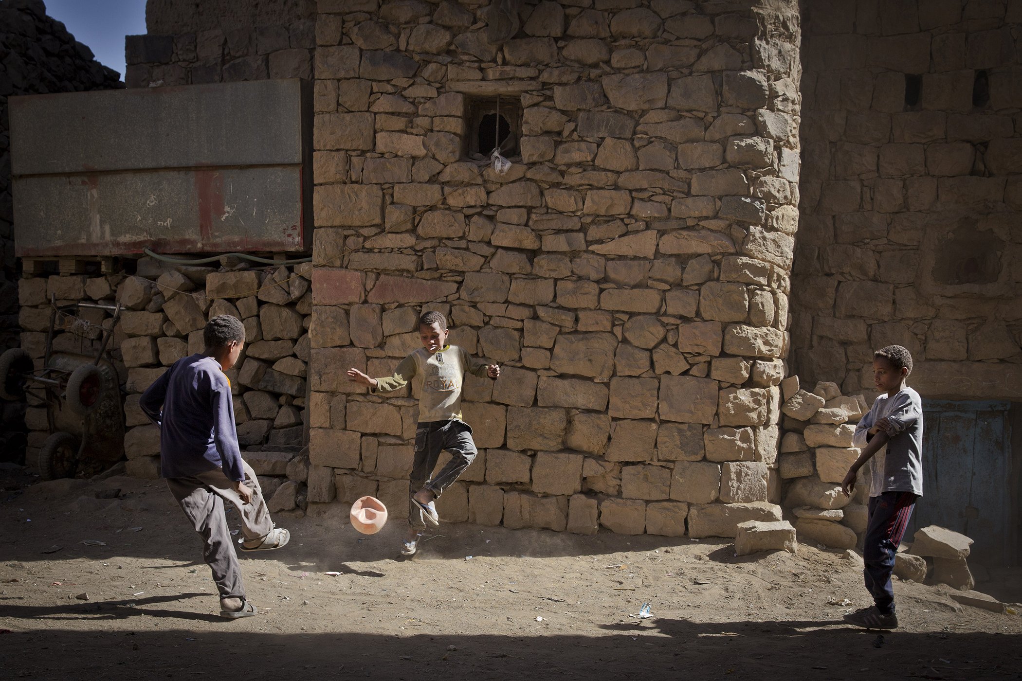 23 Photos of Kids Escaping Places of Crisis by Playing Soccer
