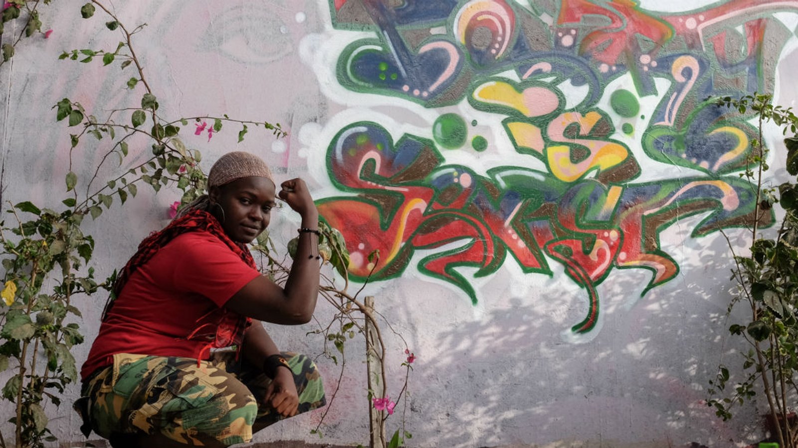 Breaking down walls by painting them: Senegal’s first lady of graffiti ...